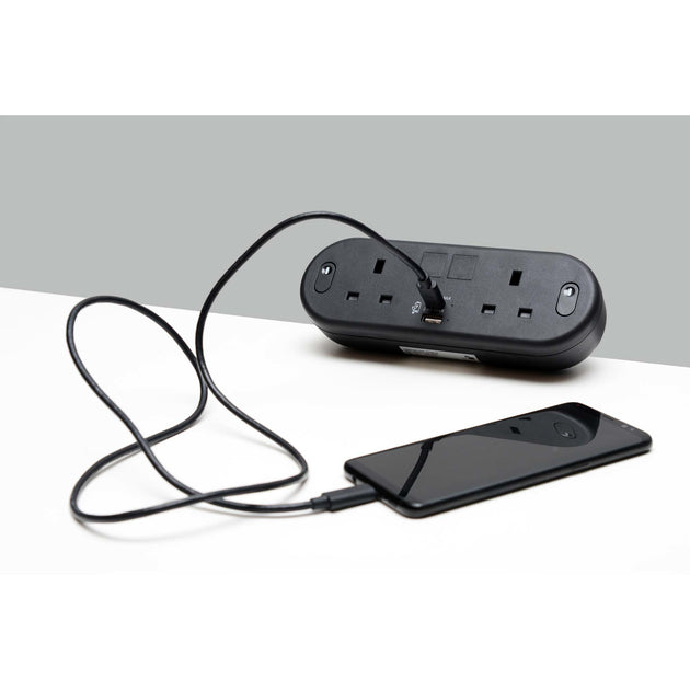 Capsule on desk power module with USB charging